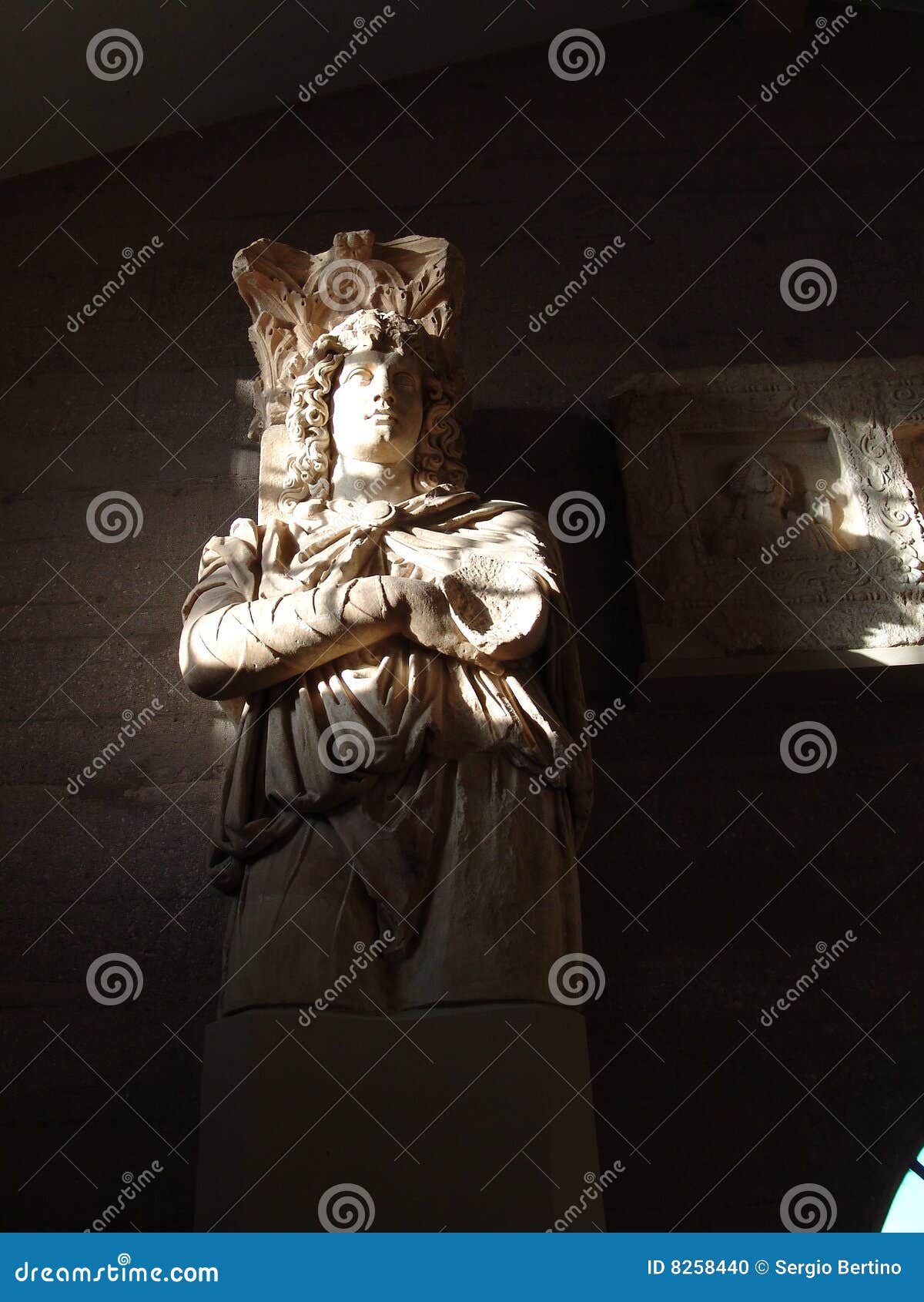 Sunlight on ancient statue stock photo. Image of museum - 8258440