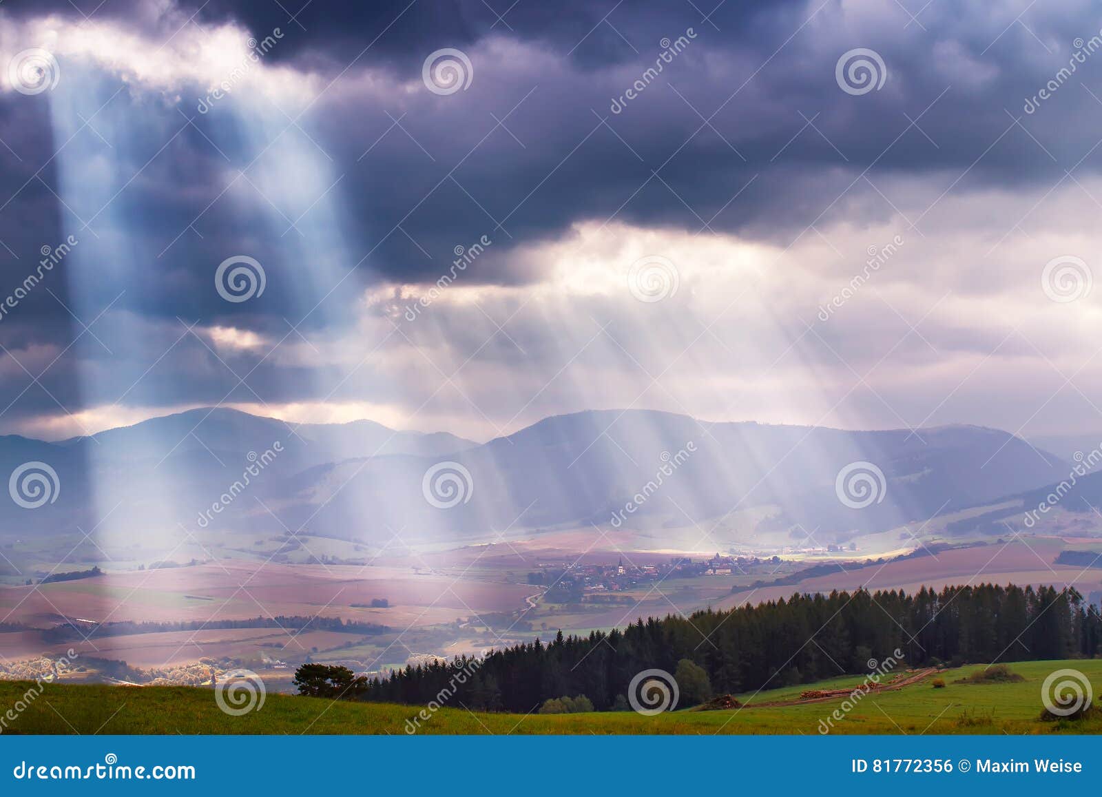 Sunlight Beams Over Clouds in Mountains. Rays in Cloudy Sky Stock Photo ...
