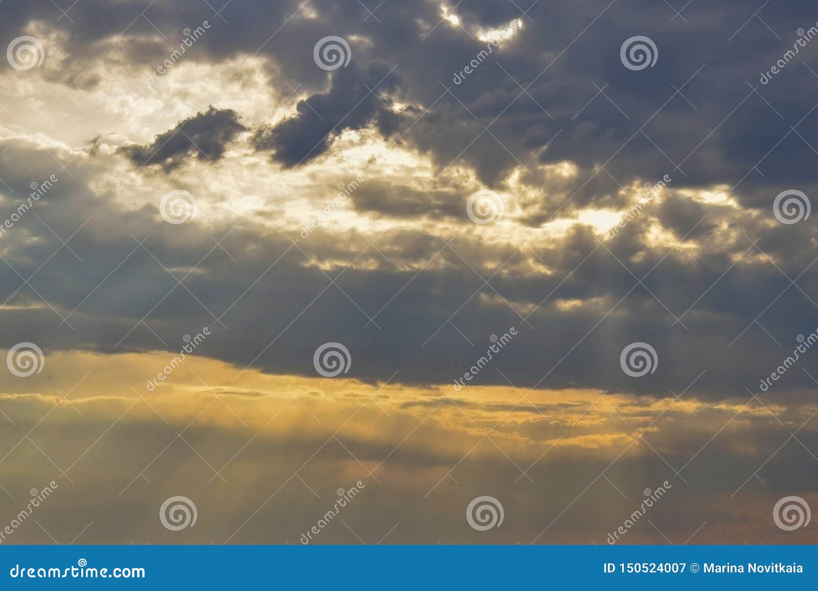 Sunlight Breaks through the Storm Clouds. Cloudy Sky at Sunset Stock ...