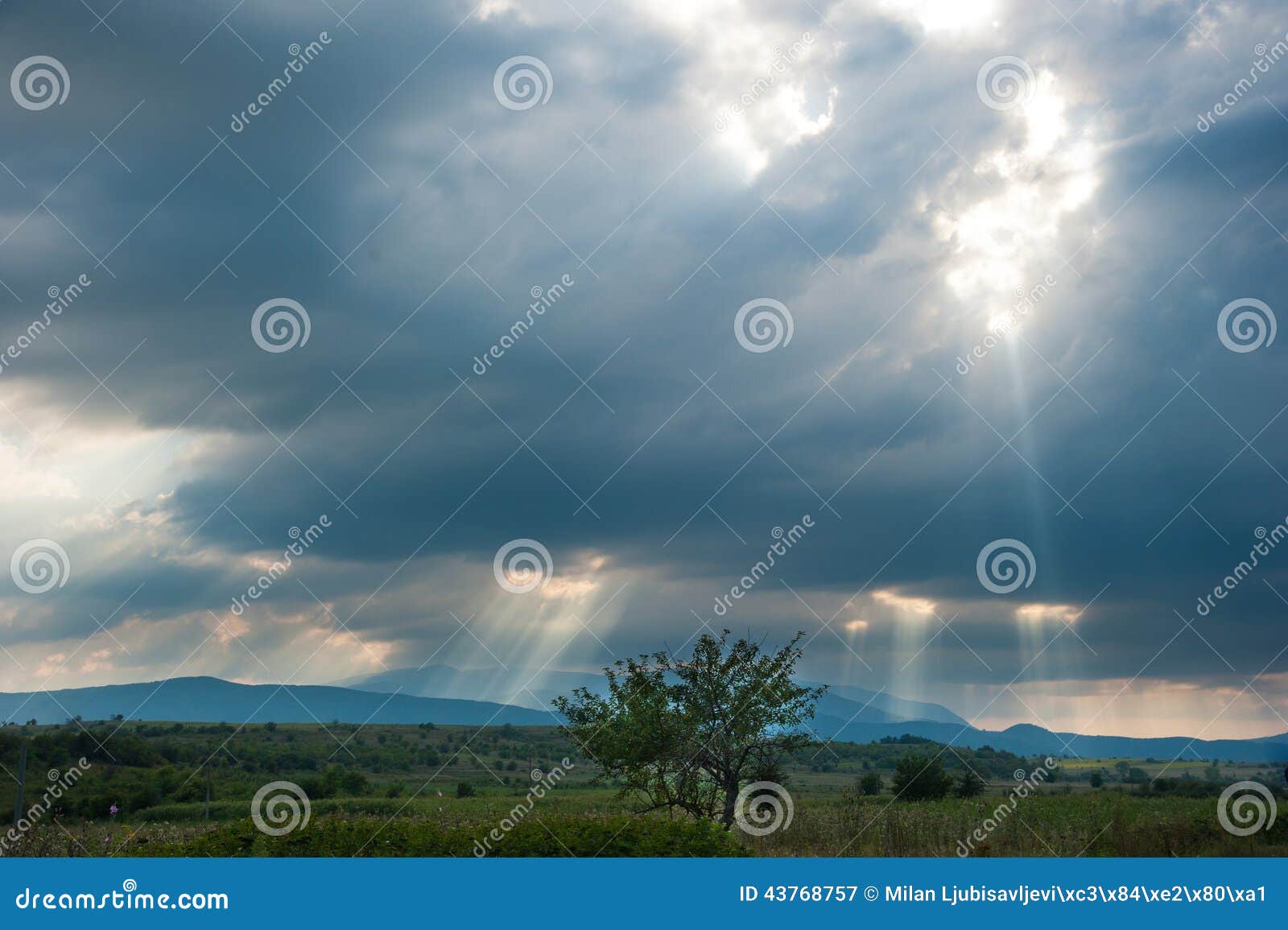 Sunlight through Clouds stock image. Image of surreal - 43768757