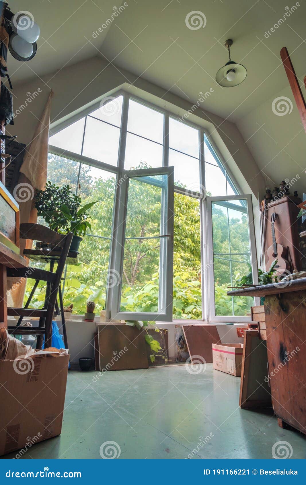 Sunlight Peeking through the Large Window with Trees Background Outside ...