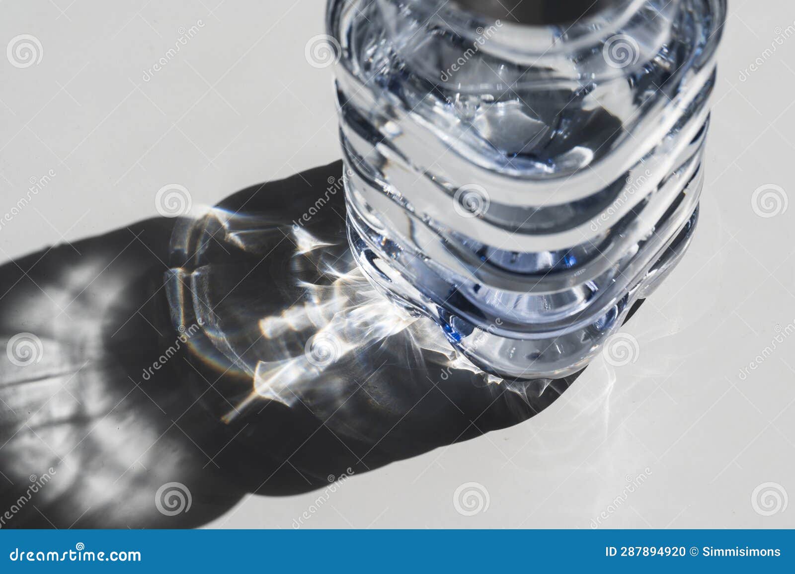 Sunlight on Plastic Bottle of Water Stock Photo - Image of design ...