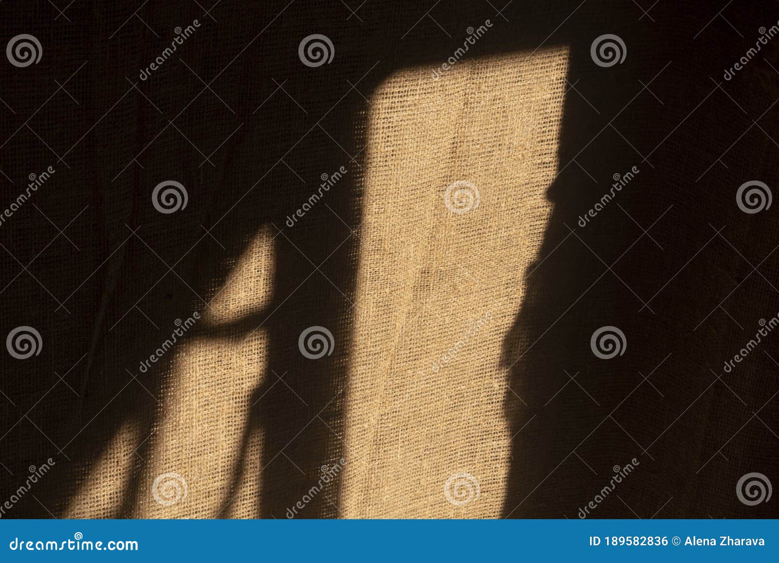 Sunlight and Shadow on a Background of Linen. Hard Light Stock Photo ...