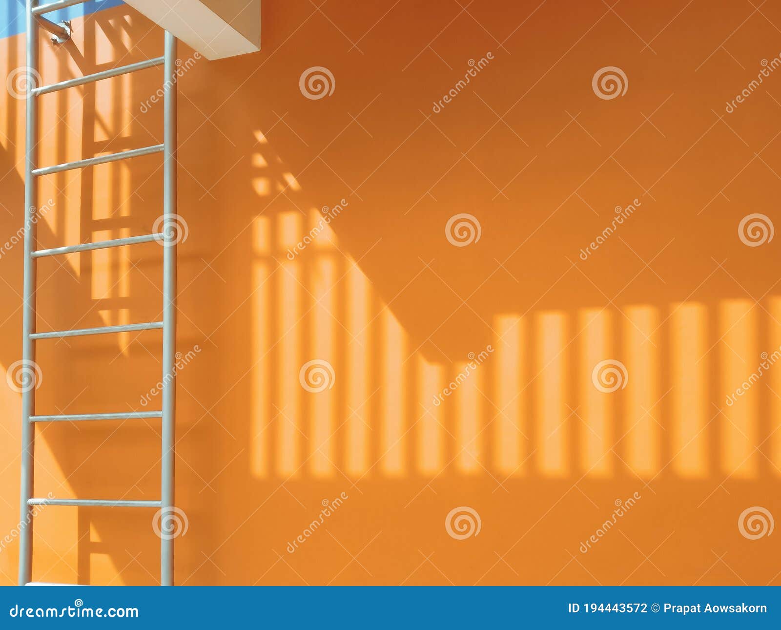 Side View of Fire Escape Outside of Orange Building Wall Stock Photo ...