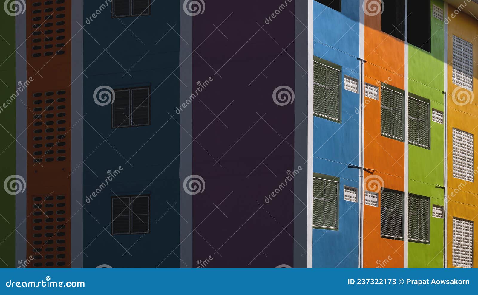 Sunlight and Shadow on Surface of Colorful Apartment Building Wall in ...