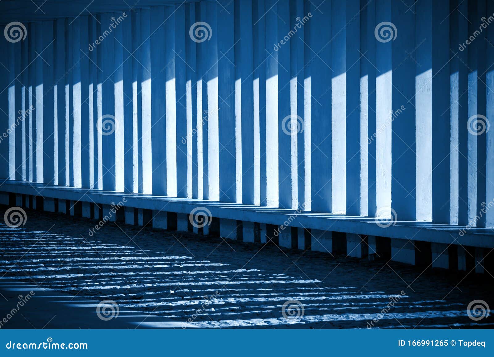 Sunlight and Shadows through Columns of Building Stock Image - Image of ...