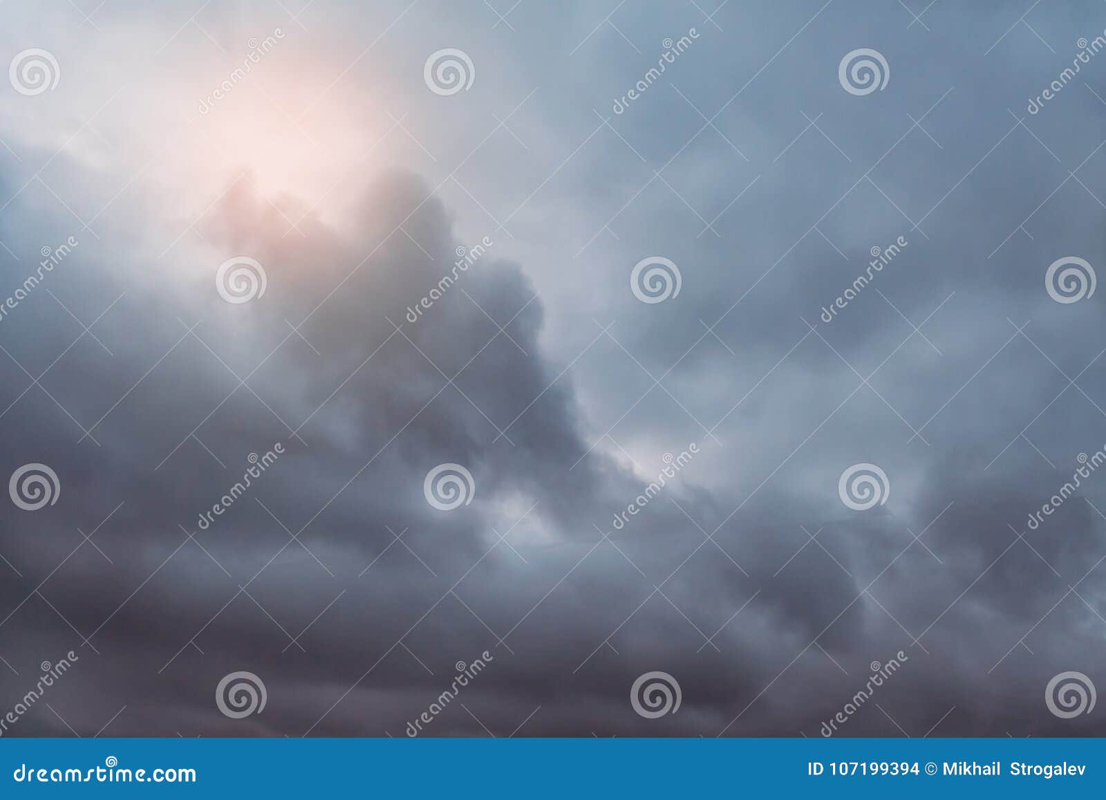 Sunlight Shines through a Gray Thundercloud Stock Photo - Image of ...