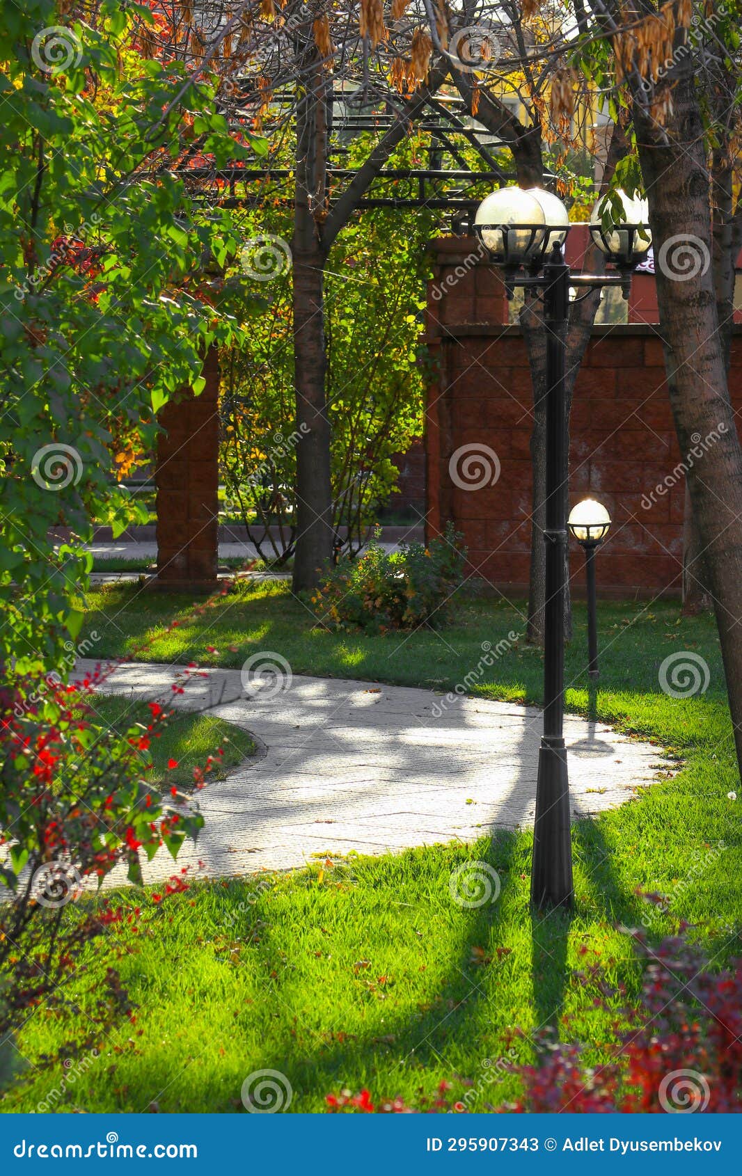 Sunlight Streams into the Garden with Lanterns, Paths and Grass ...