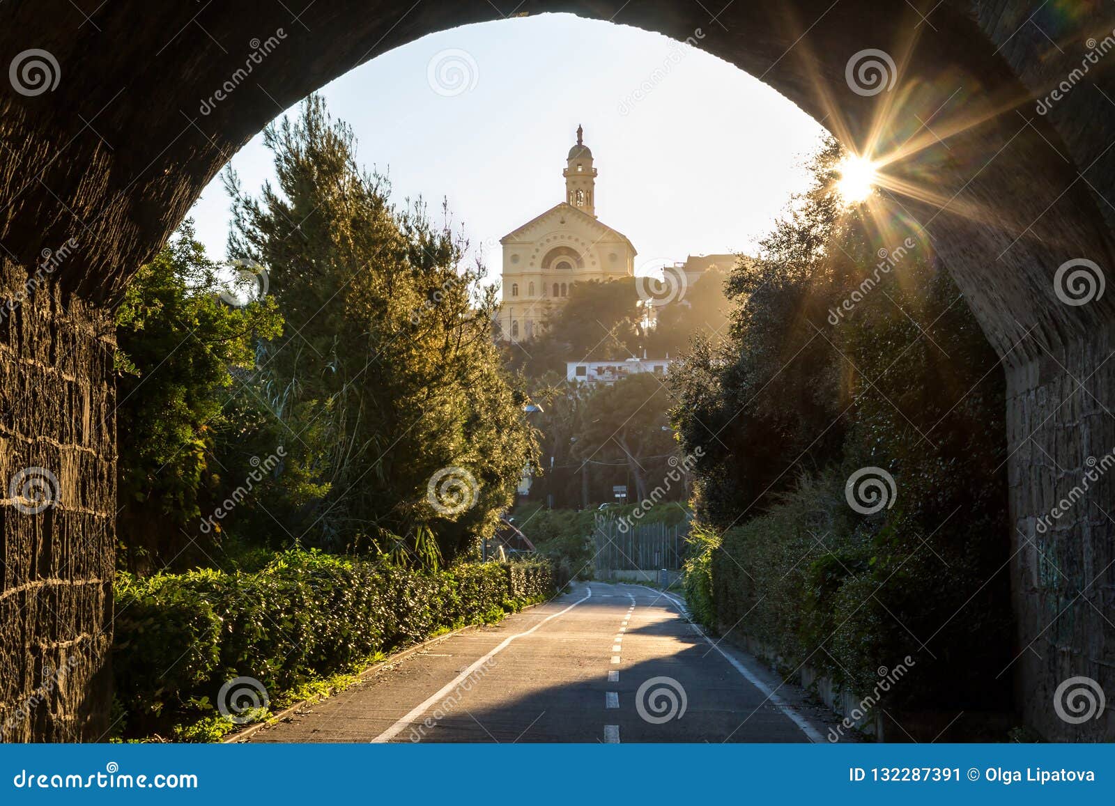 Sunlit Arch Over a Bicycle Path Stock Image - Image of italy, europe ...