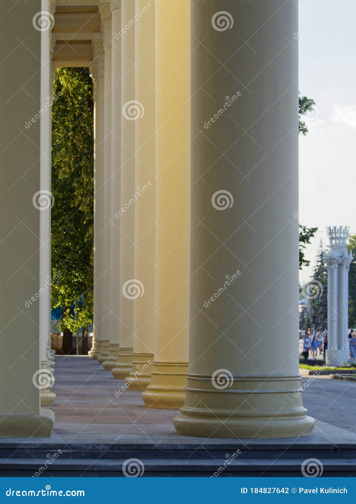 Sunlit Colonnade of a Building Stock Photo - Image of structure, white ...