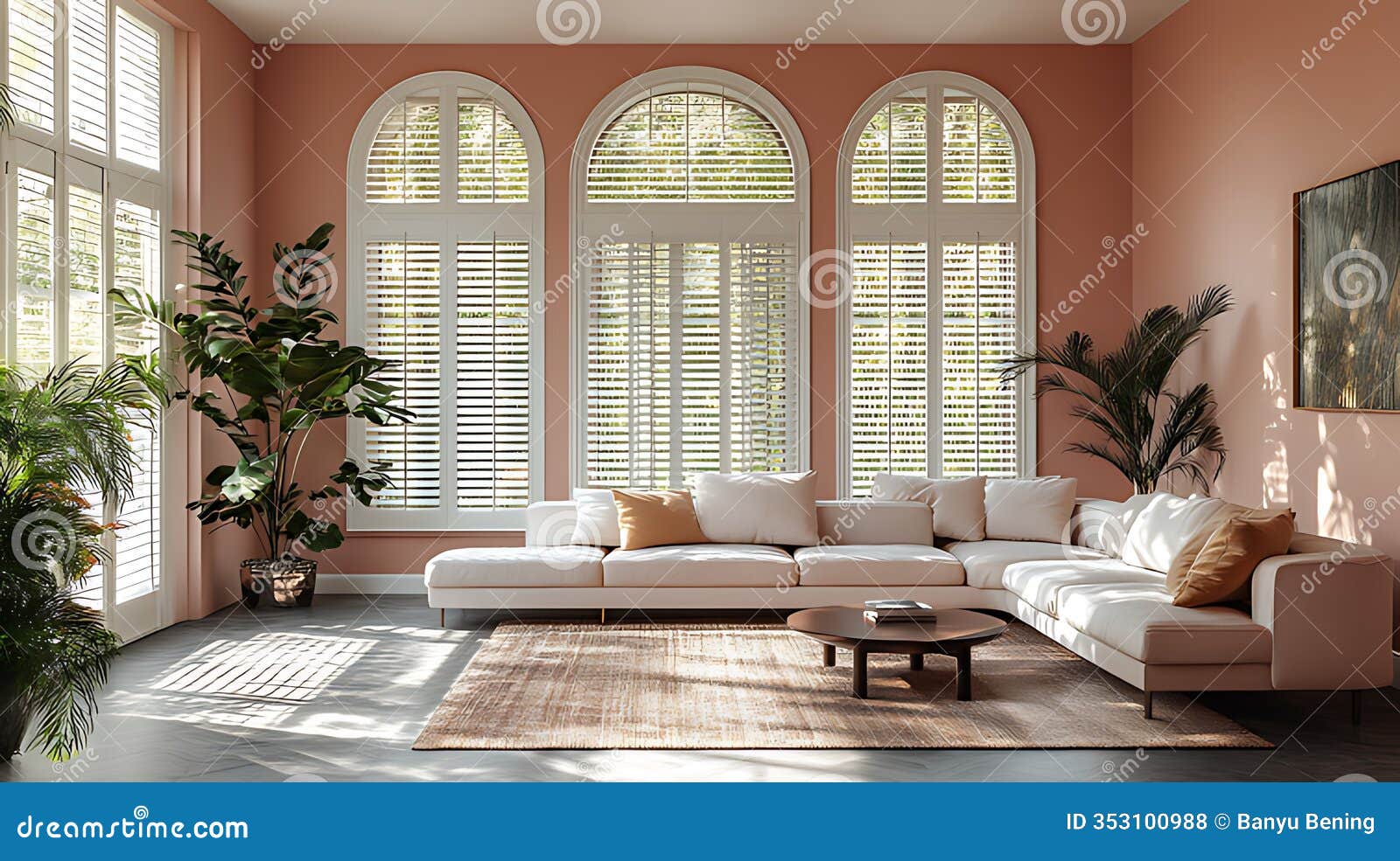 Sunlit Living Room with Arched Windows, White Shutters, Sectional Sofa ...