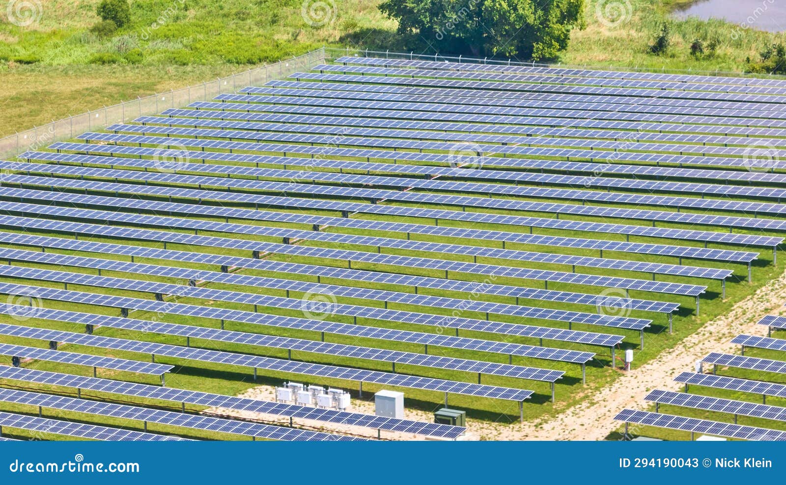 Sunlit Rows of Solar Panels on Corner Edge of Solar Farm Aerial Stock ...