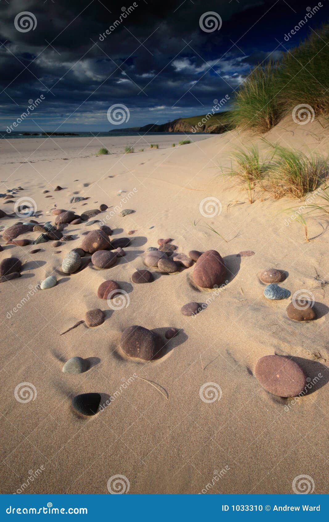 Sunlit Sandy Beach with Pebbles Stock Photo - Image of learning, sandy ...