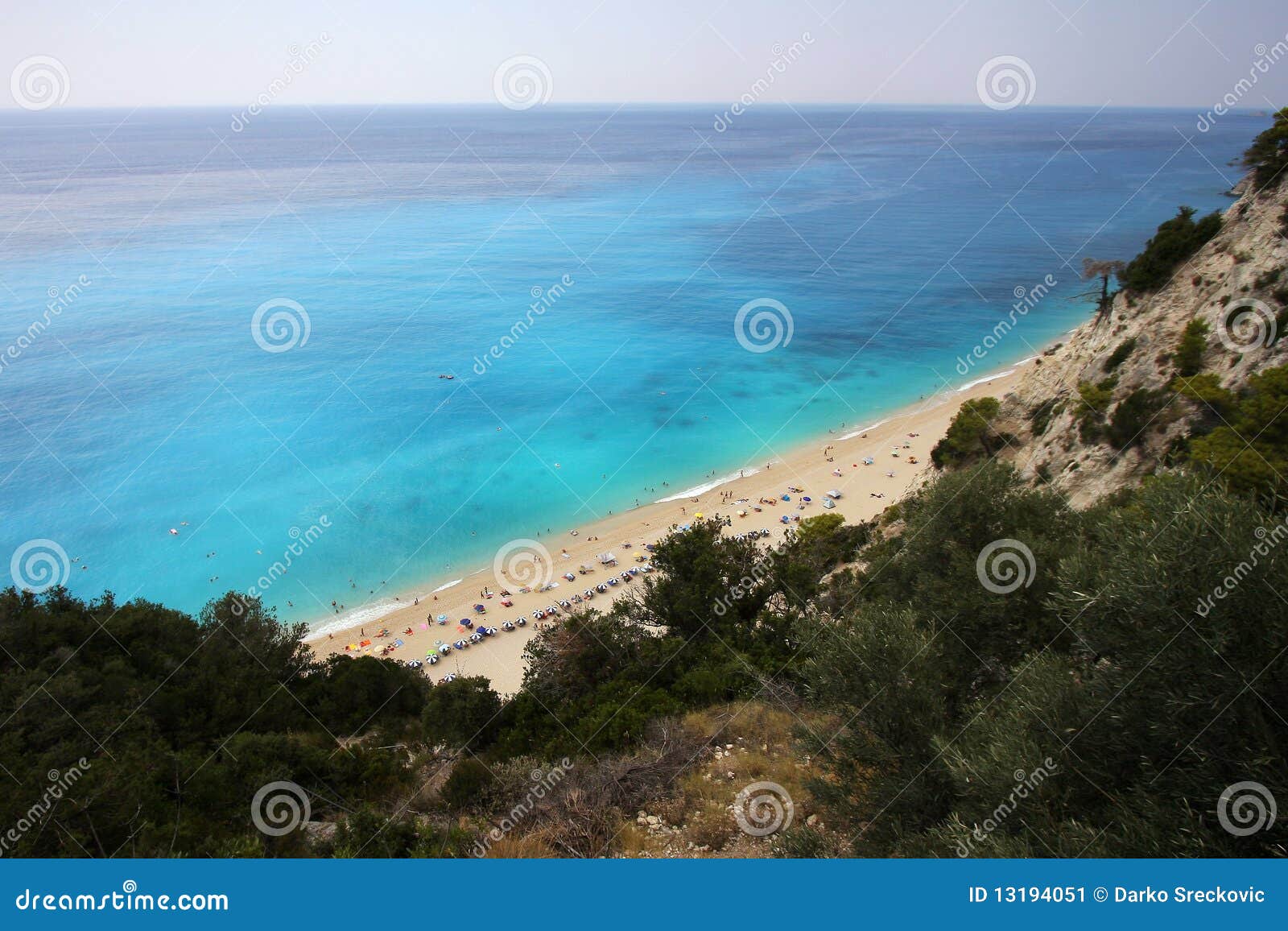 Sunny beach in Greece stock image. Image of water, green - 13194051
