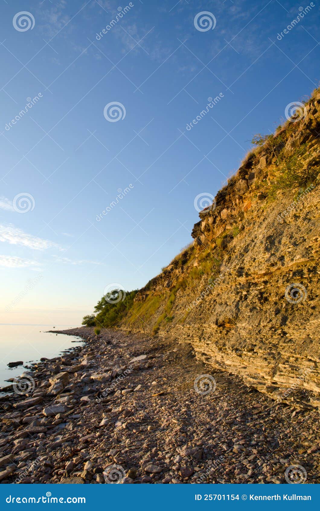 Sunny Cliff Steep at a Stony Coast Stock Photo - Image of baltic, blue ...