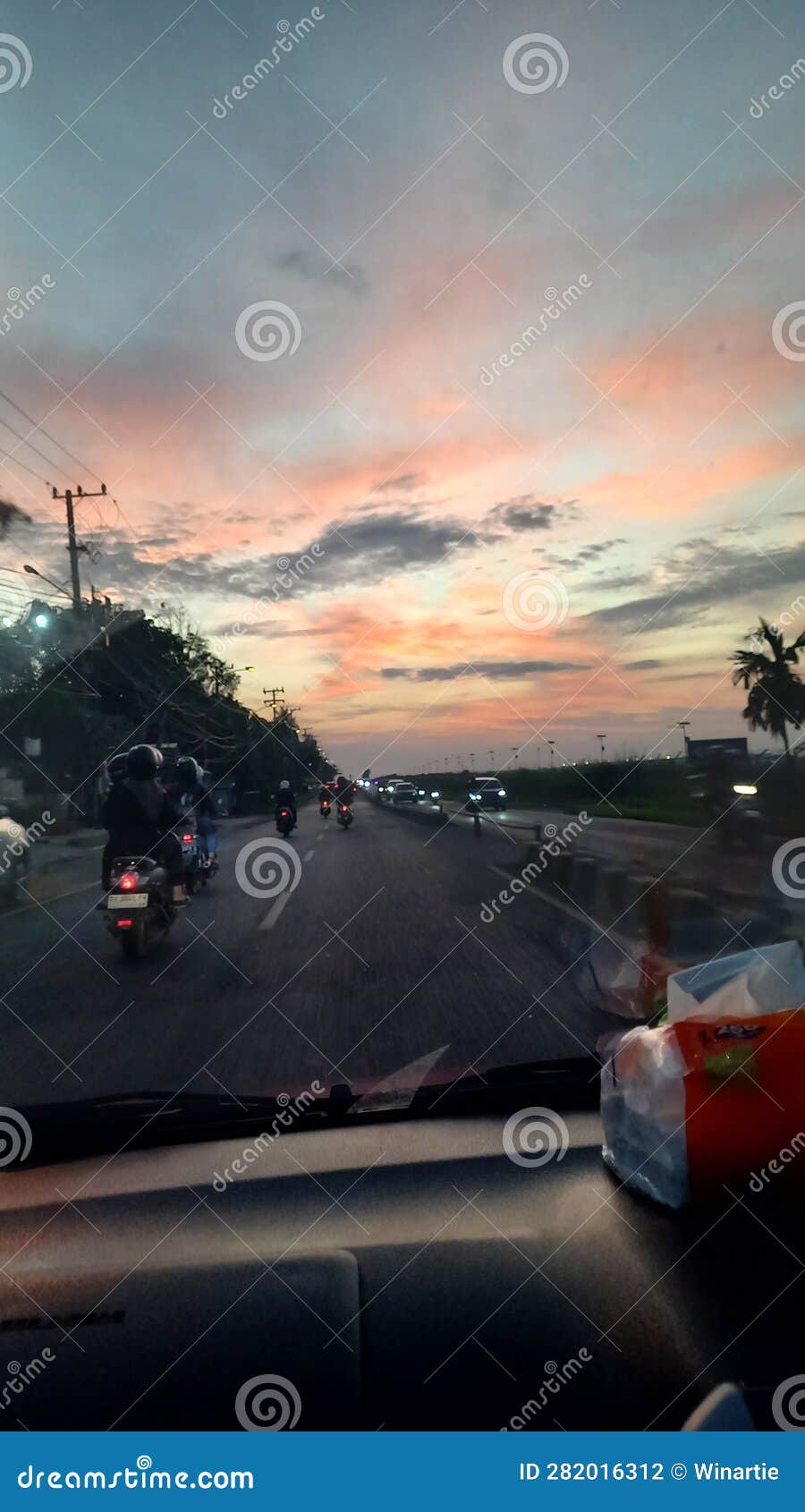 Sunny Clouds in the Afternoon and Busy Traffic Stock Photo - Image of ...