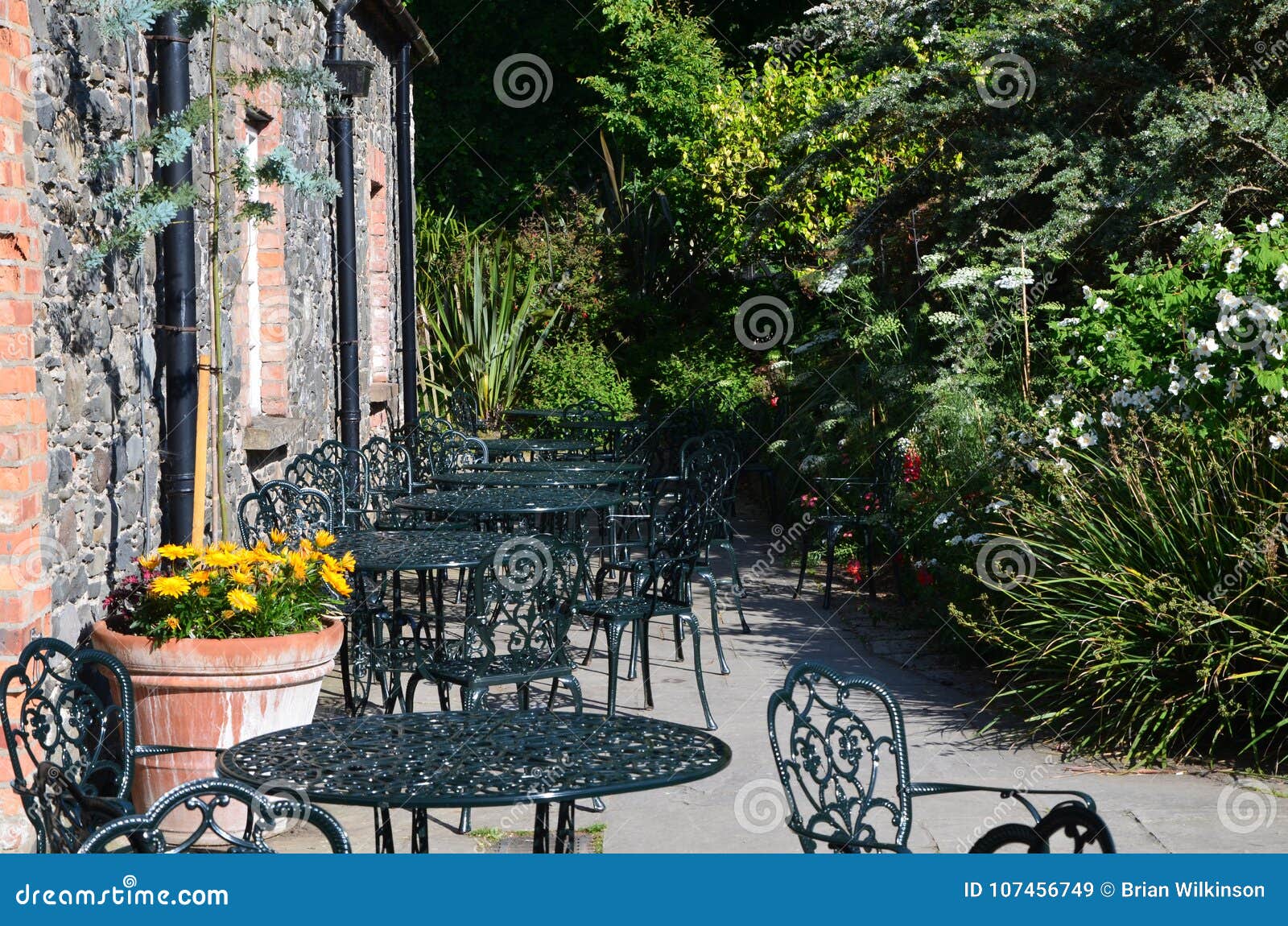 Courtyard seating stock image. Image of suntrap, secluded - 107456749