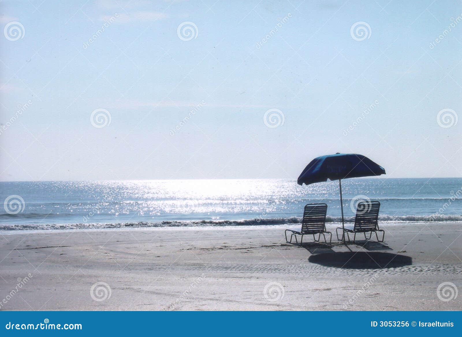 Sunny day at the beach stock photo. Image of solitude - 3053256