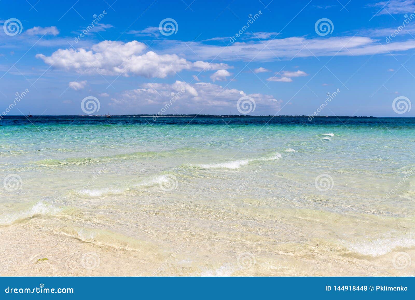 Sunny day on ocean shore stock photo. Image of season - 144918448
