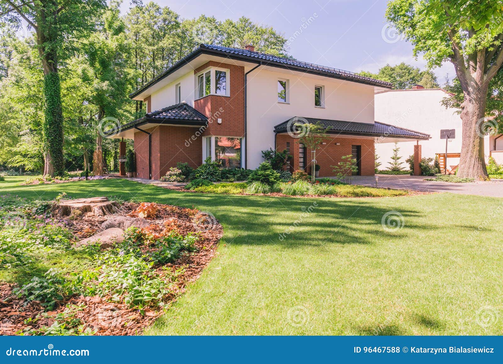 Sunny Garden of Modern House Stock Photo - Image of exterior, shrubs ...