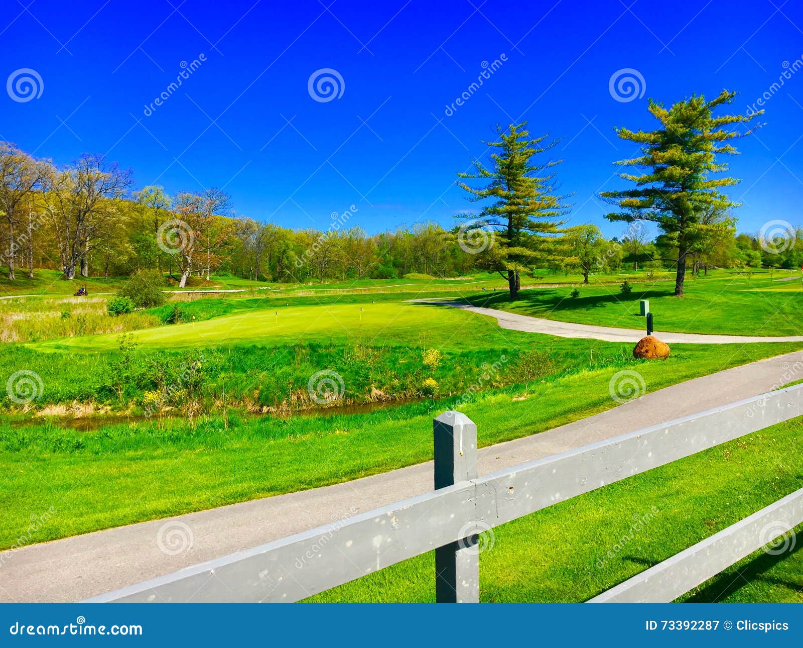 Sunny Golf Course stock image. Image of expansive, picturesque - 73392287