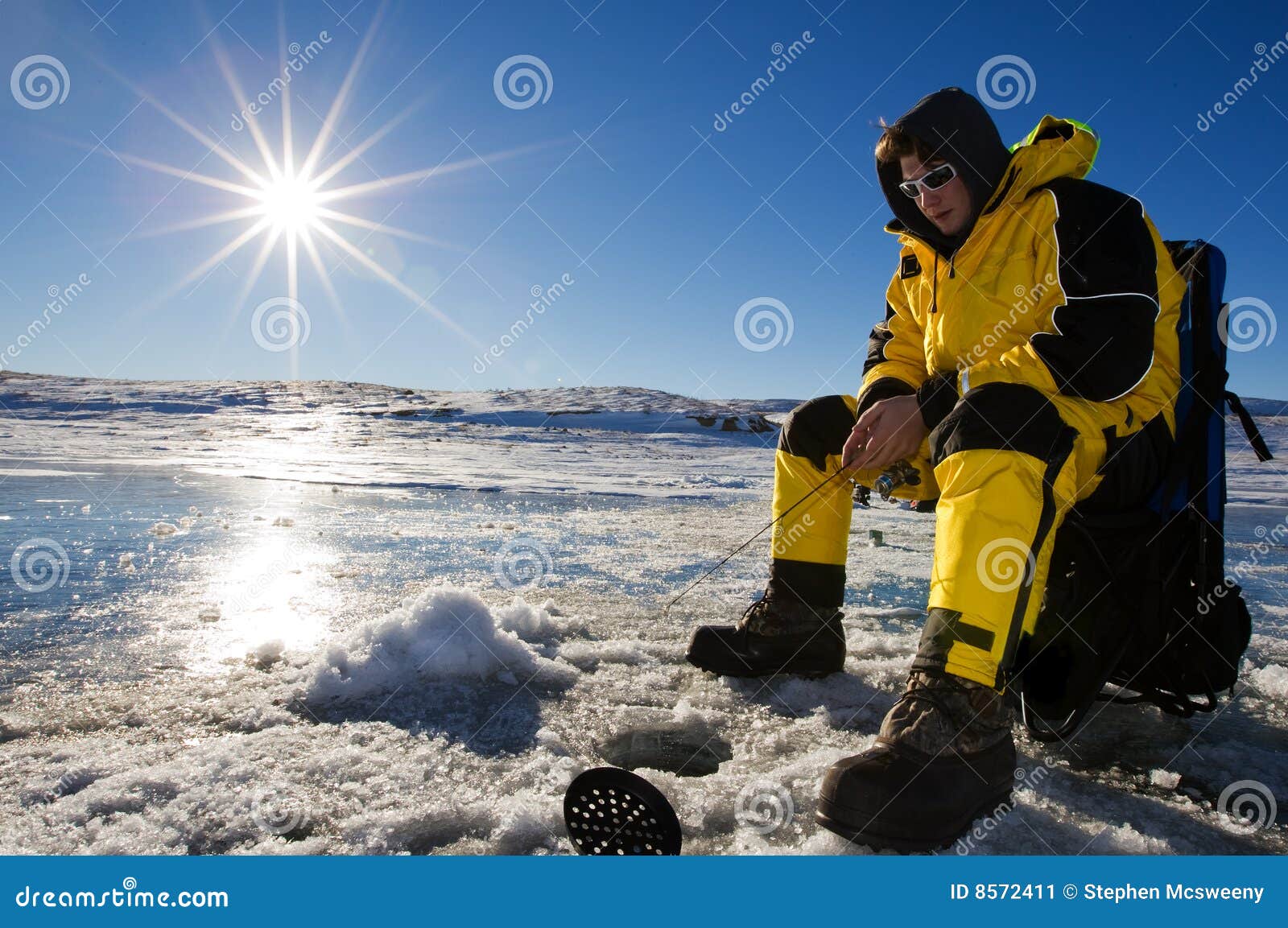 Sunny ice fishing stock image. Image of hole, cold, nature - 8572411