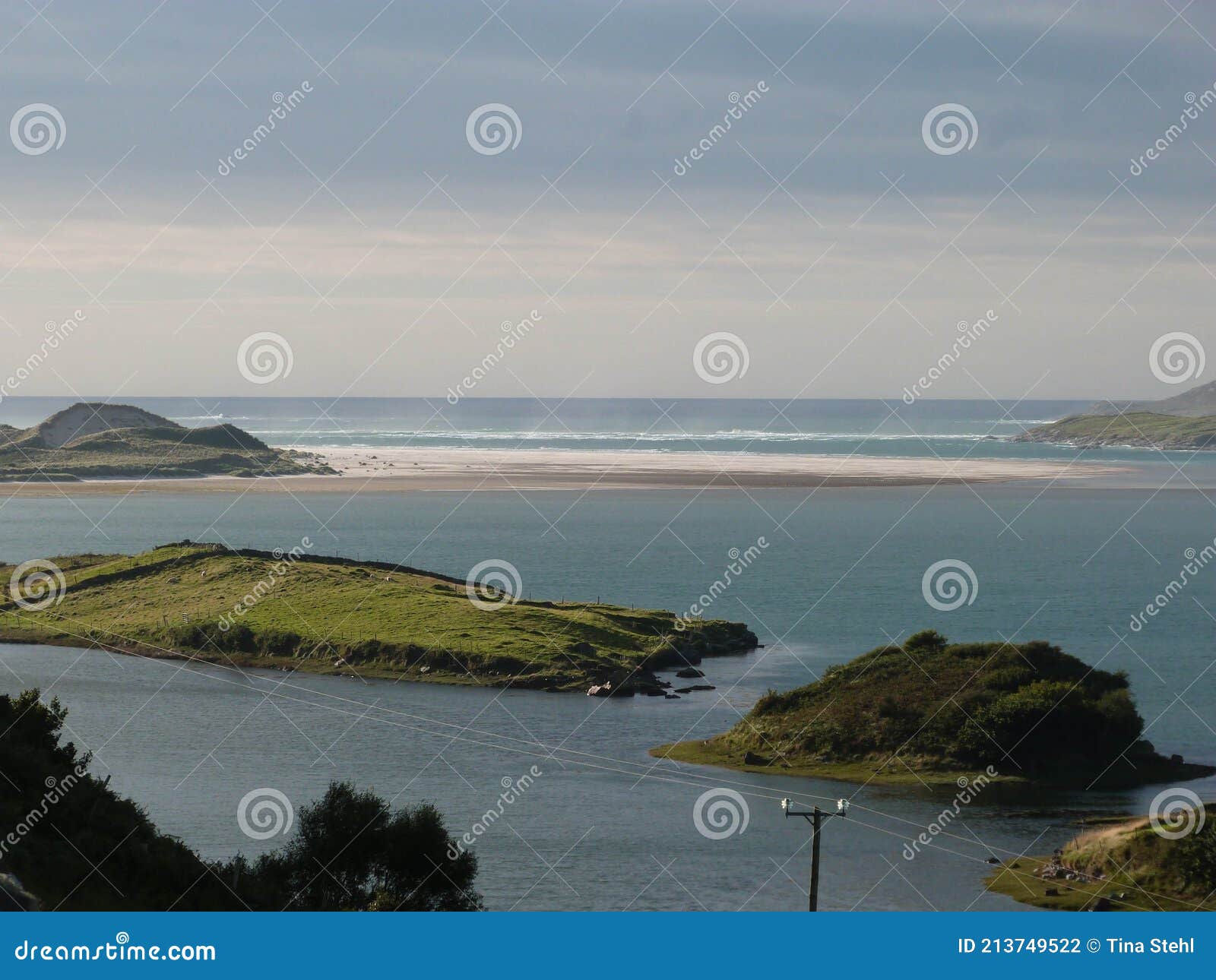 Sunny Irish Landscape with Ocean and Mountains and Green Fields Stock ...