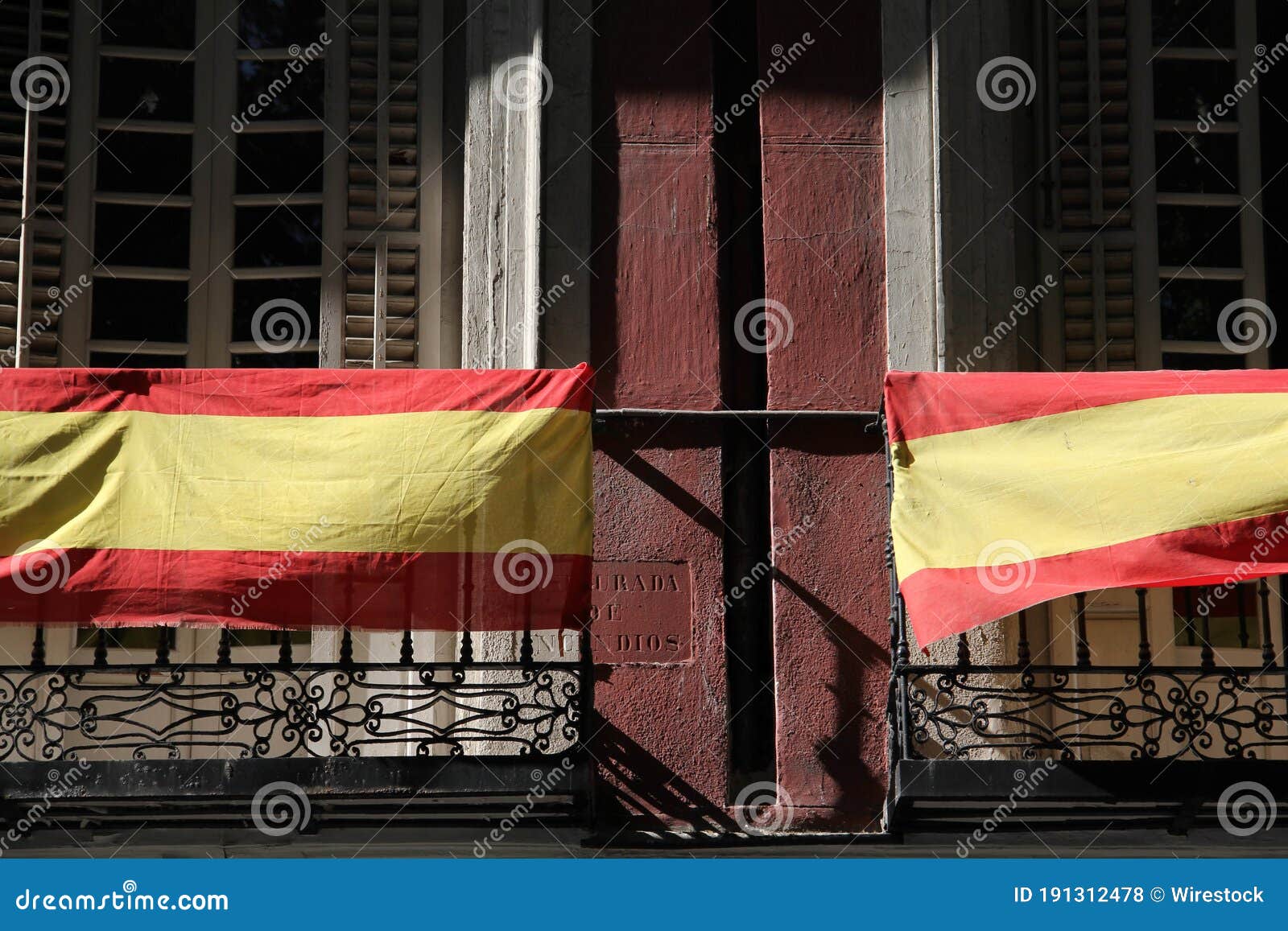 Sunny Scenery of Building Balconies with Spain Flags Stock Photo ...