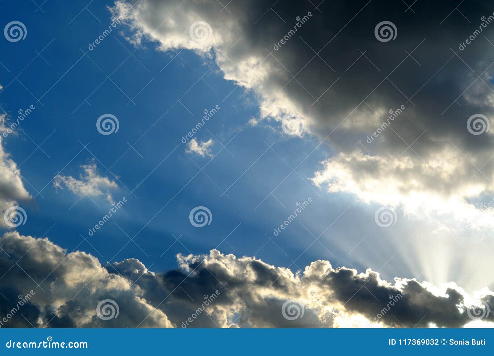 Sunrays Across Clouds, with Blue Space Stock Photo - Image of blue ...