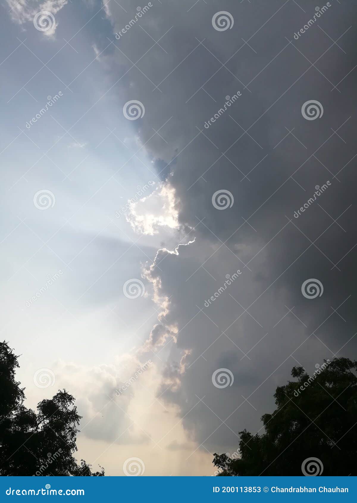 Sunrays Behind Dark Cloud Like Disco Light Stock Image - Image of dark ...