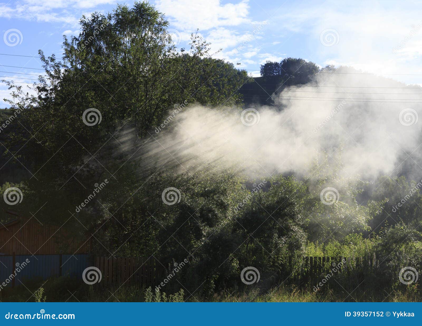 Sunrays through the smoke stock photo. Image of rays - 39357152