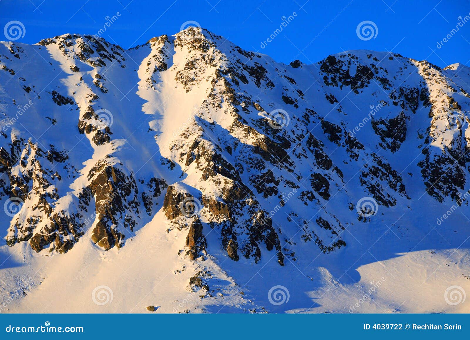 Sunrise stock photo. Image of snow, summit, sunrise, mountains - 4039722