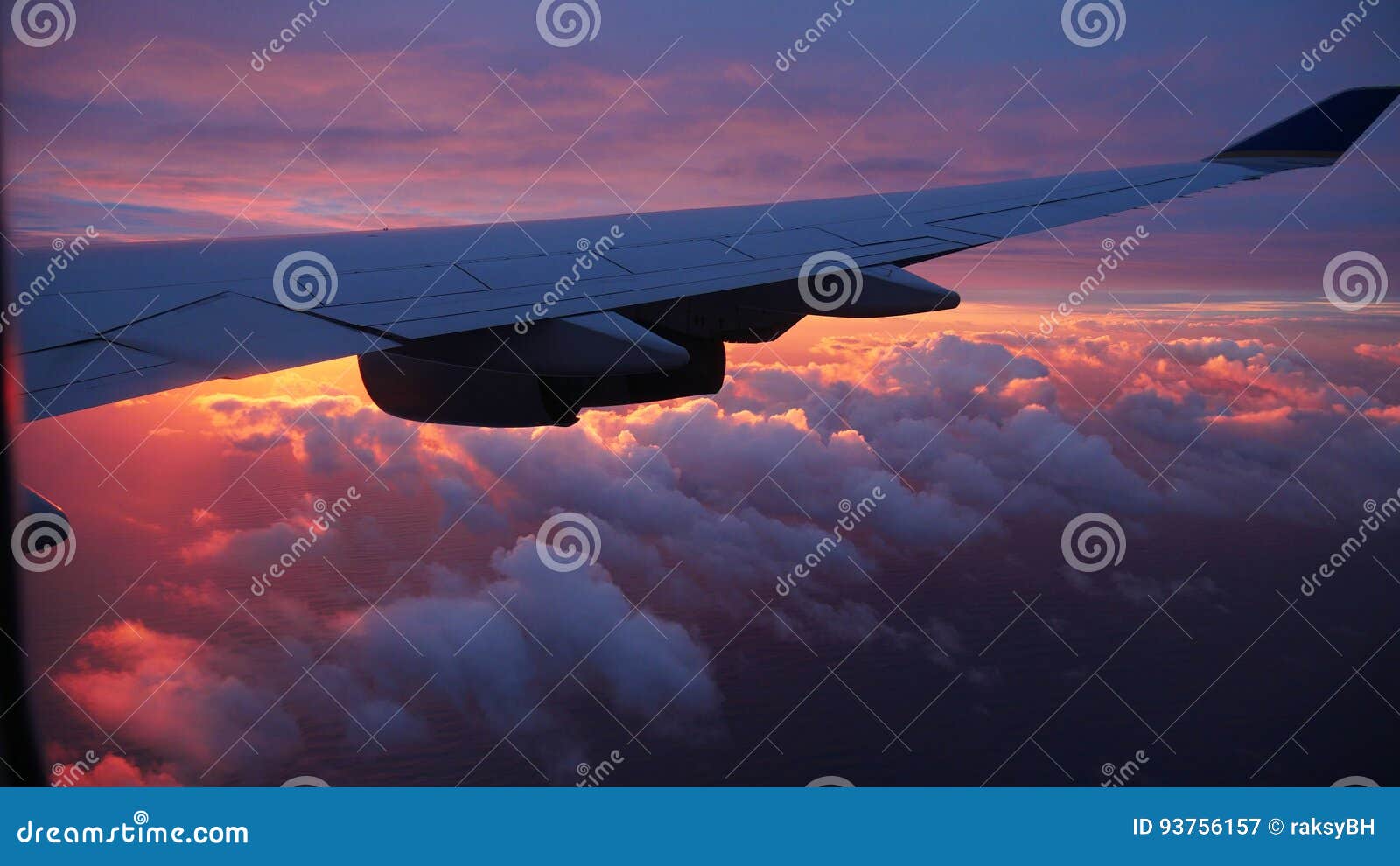 Sunrise from an Airplane Window Above the Clouds Stock Image - Image of ...