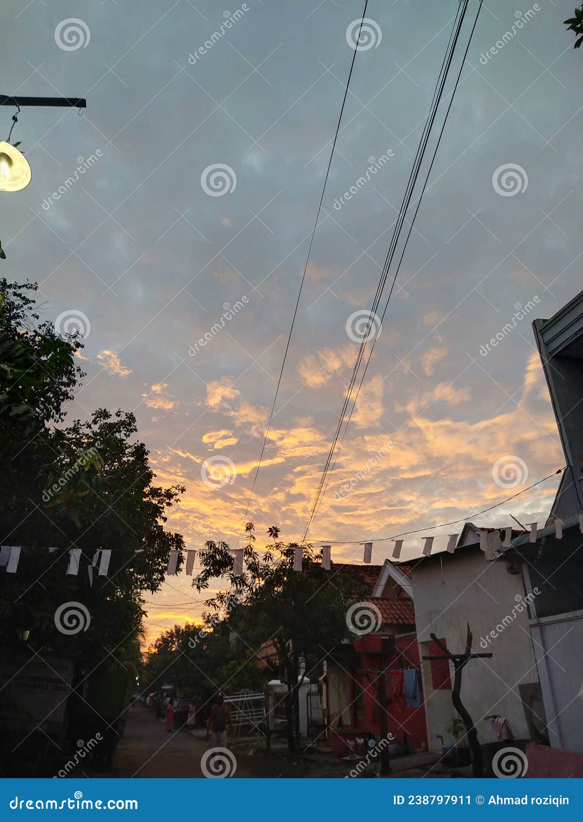 Sunrise in an alley stock image. Image of alley, square - 238797911
