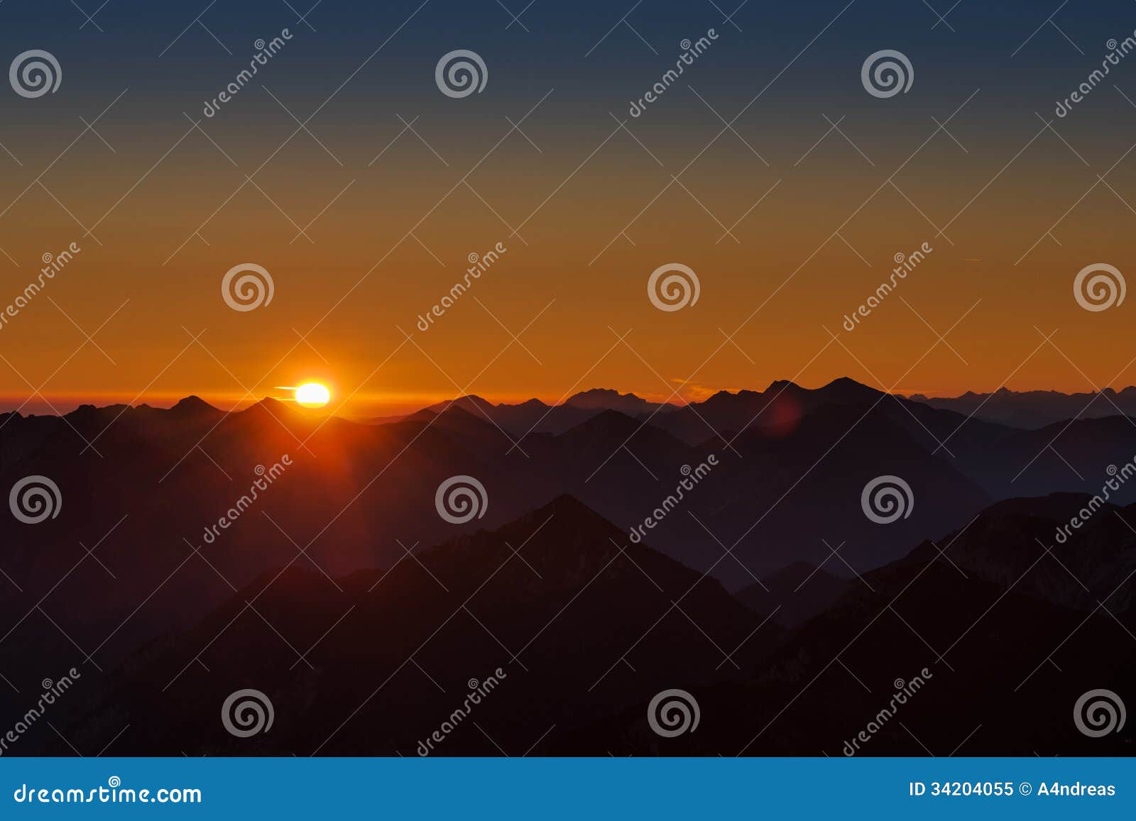 Sunrise in Austrian Mountains with Glowing Sun Stock Image - Image of ...