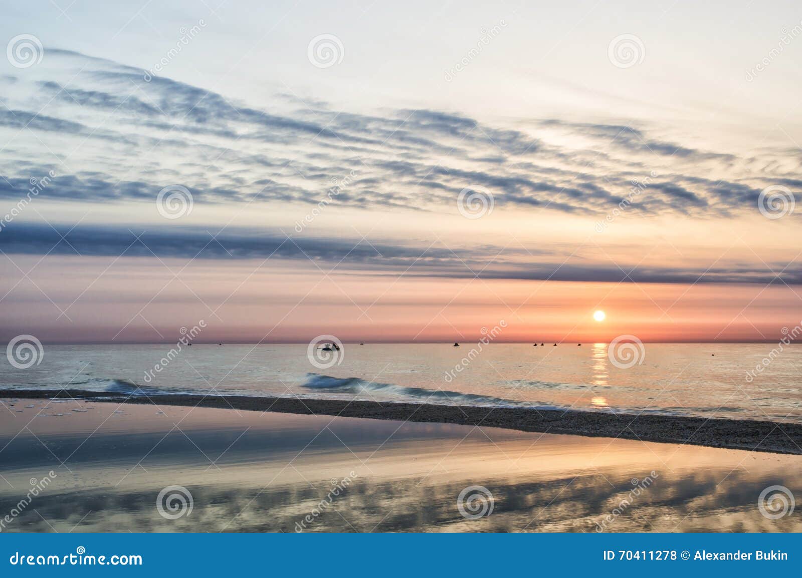 Sunrise on the Beach, the Fishermen, the Solar Path Stock Photo - Image ...