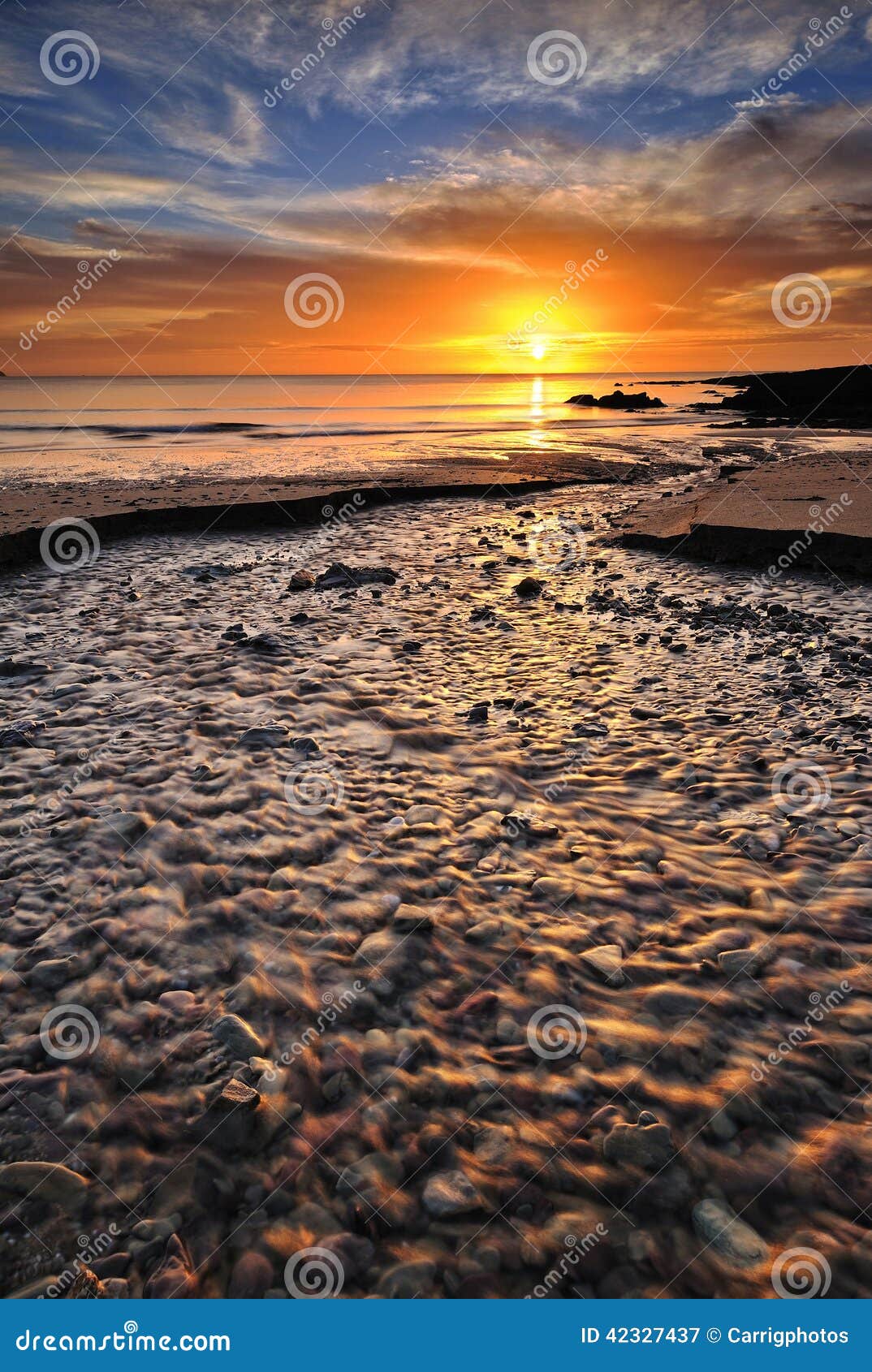 Sunrise on a Beach stock image. Image of stones, nature - 42327437