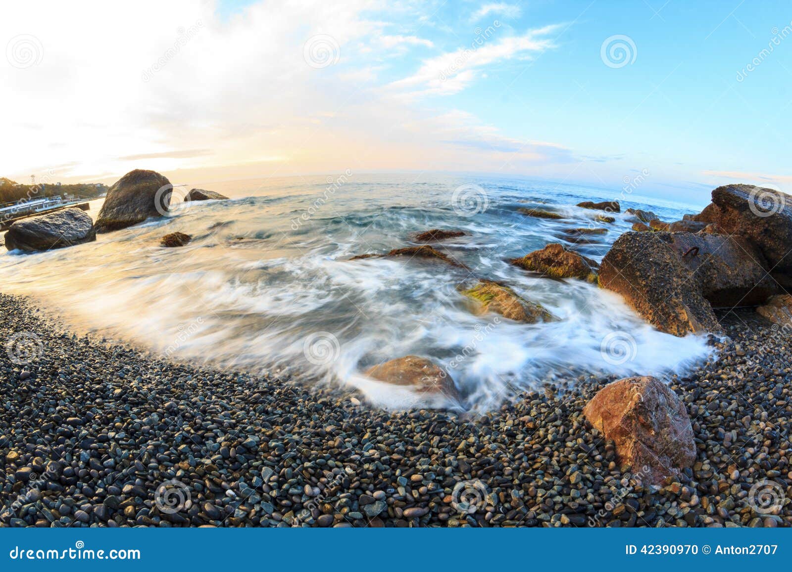 Sunrise on Beach with Rocks and Sea Stock Photo - Image of coastline ...