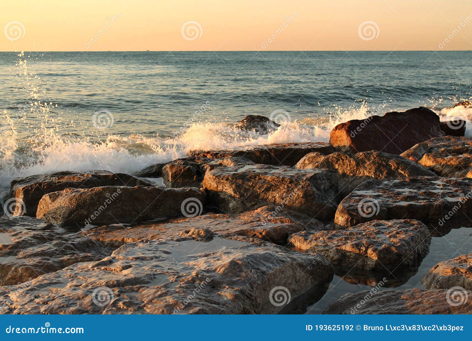 Sunrise on the Beach Stones Stock Photo - Image of landscape, ripple ...
