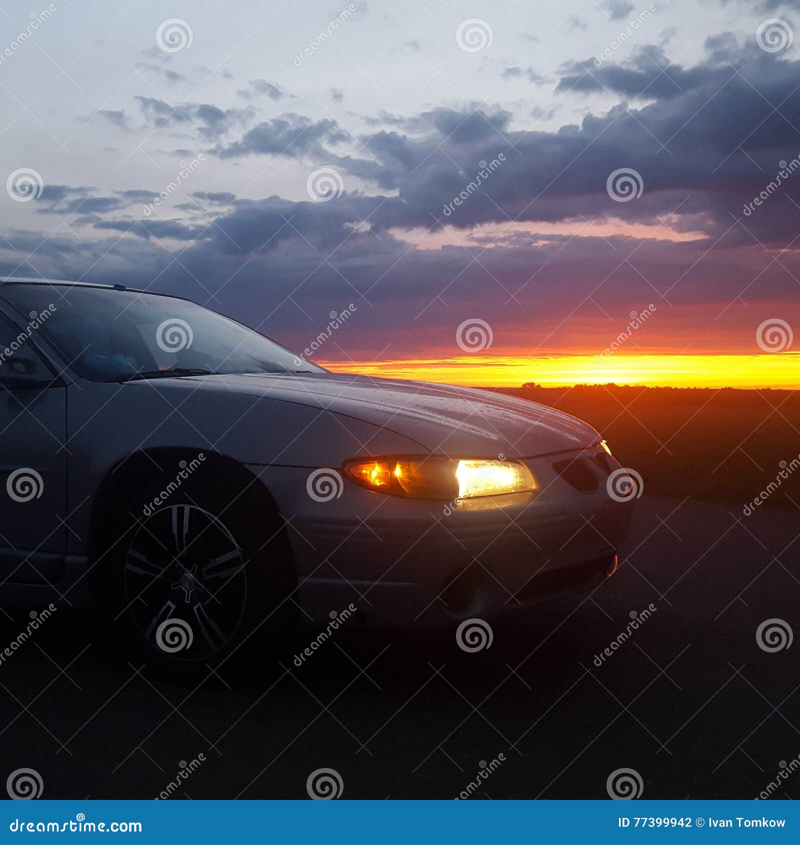 Sunrise with car stock photo. Image of sunrise, front - 77399942