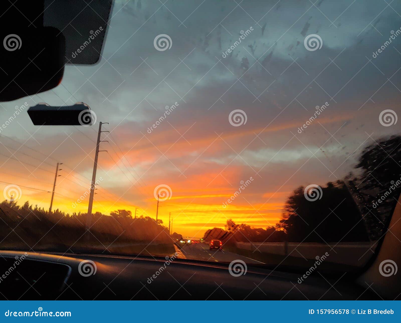 Sunrise Cloudy Sky through Windshield of the Car Stock Photo - Image of ...