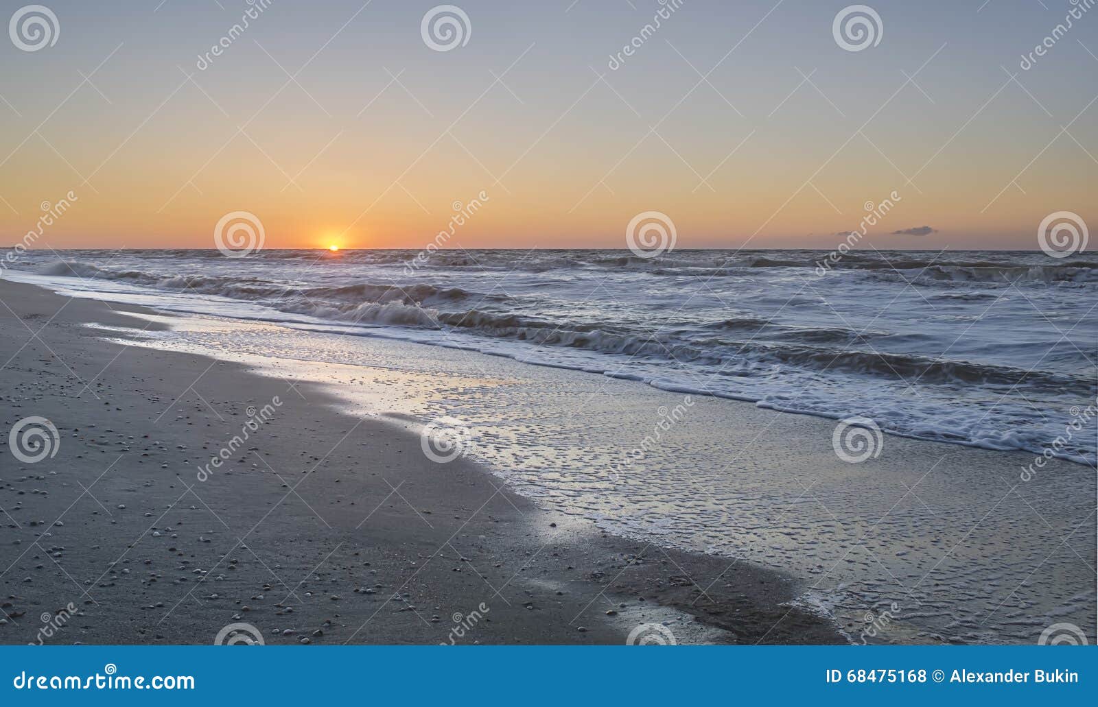 Sunrise on a Cold Beach Sea. Stock Photo - Image of opportunity, dawn ...