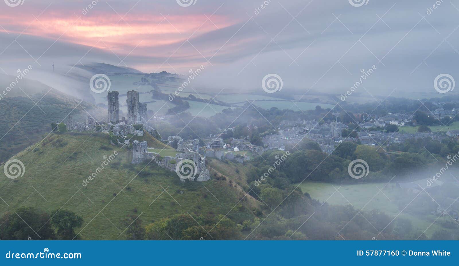 Sunrise at Corfe Castle in Mist Stock Photo - Image of trees, purbeck ...
