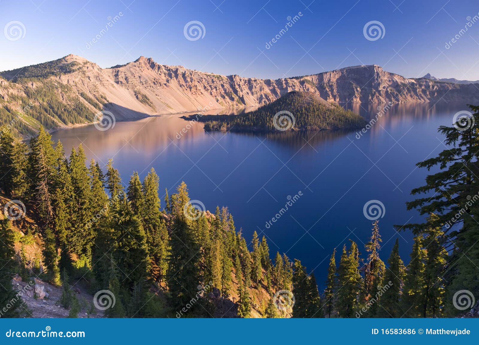 Sunrise at Crater Lake Volcano in Oregon Stock Photo - Image of lake ...