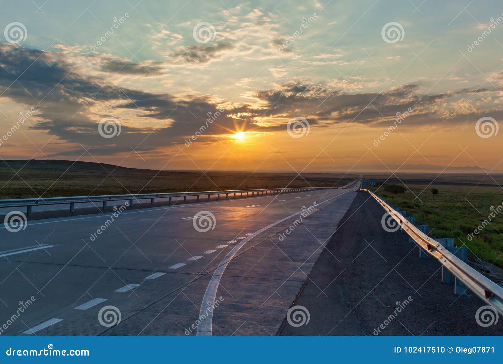 Sunrise on the highway stock photo. Image of country - 102417510