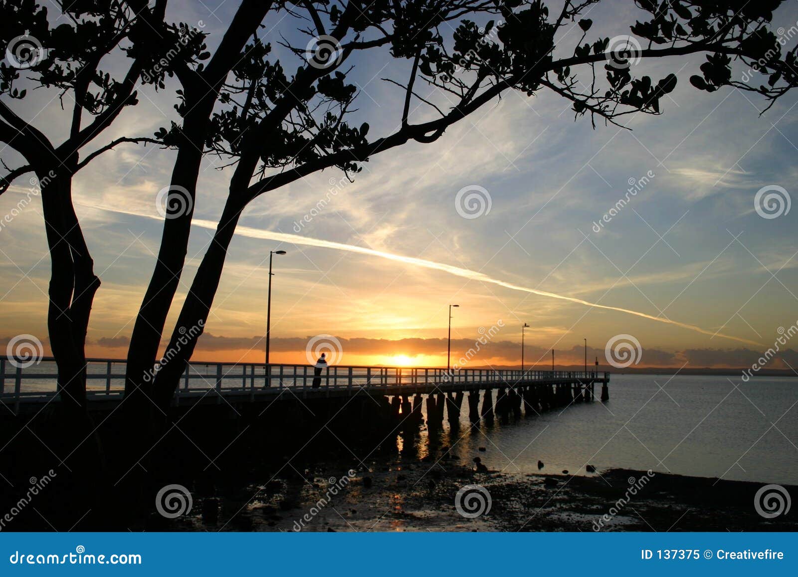 Sunrise at Jetty stock image. Image of morning, dawn, beach - 137375