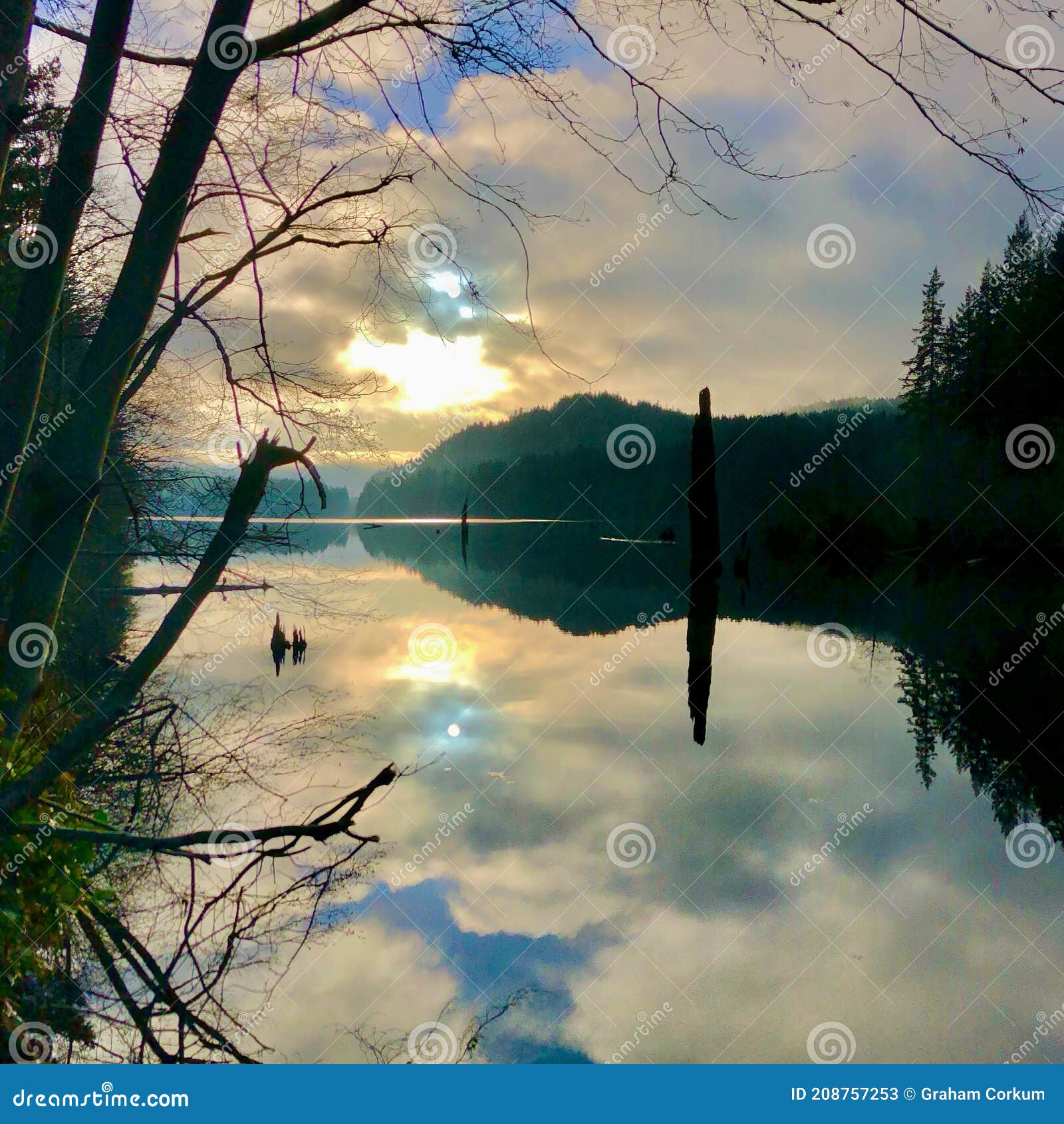 Sunrise on a lake stock image. Image of water, lakes - 208757253