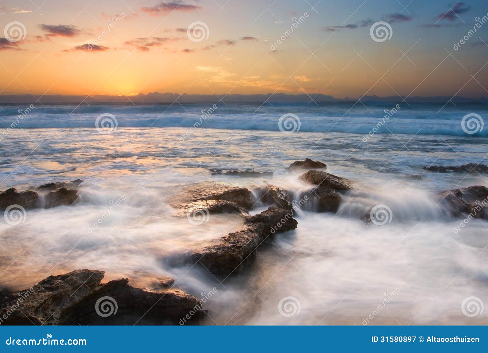 Sunrise Landscape of Ocean with Waves Clouds and Rocks Stock Image ...
