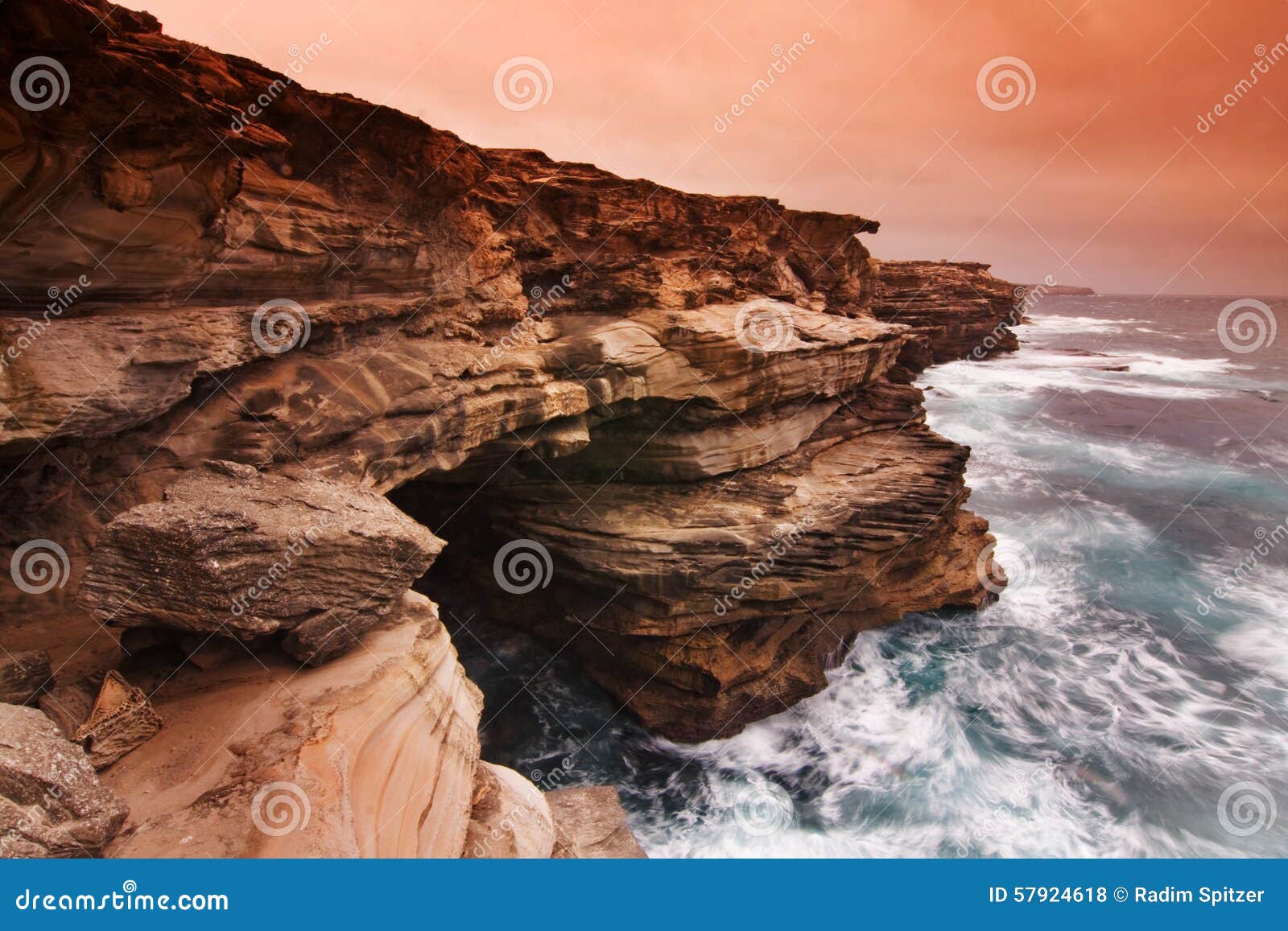 Sunrise Landscape of Ocean with Waves Clouds and Rocks Stock Photo ...