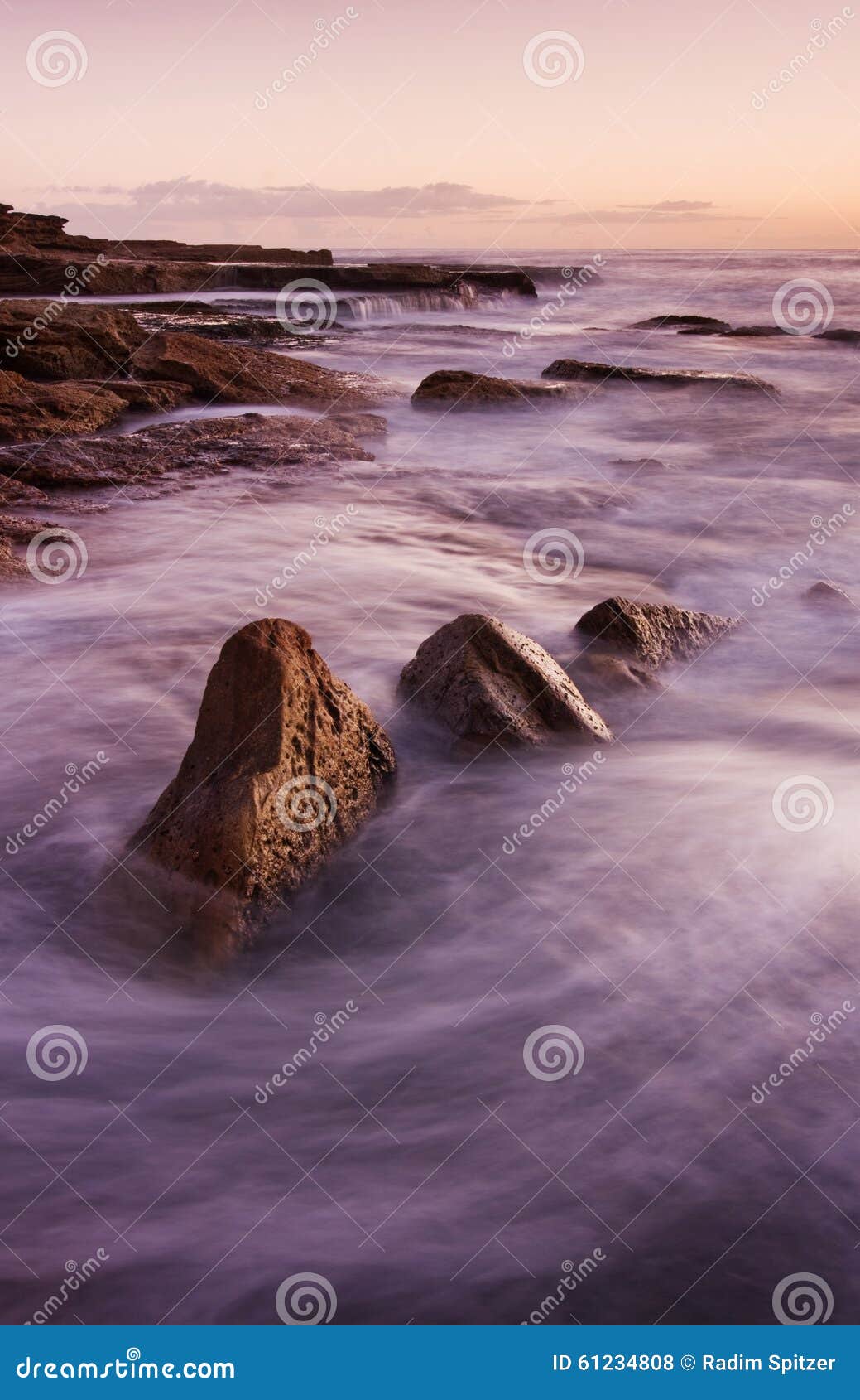 Sunrise Landscape of Ocean with Waves Clouds and Rocks Stock Photo ...